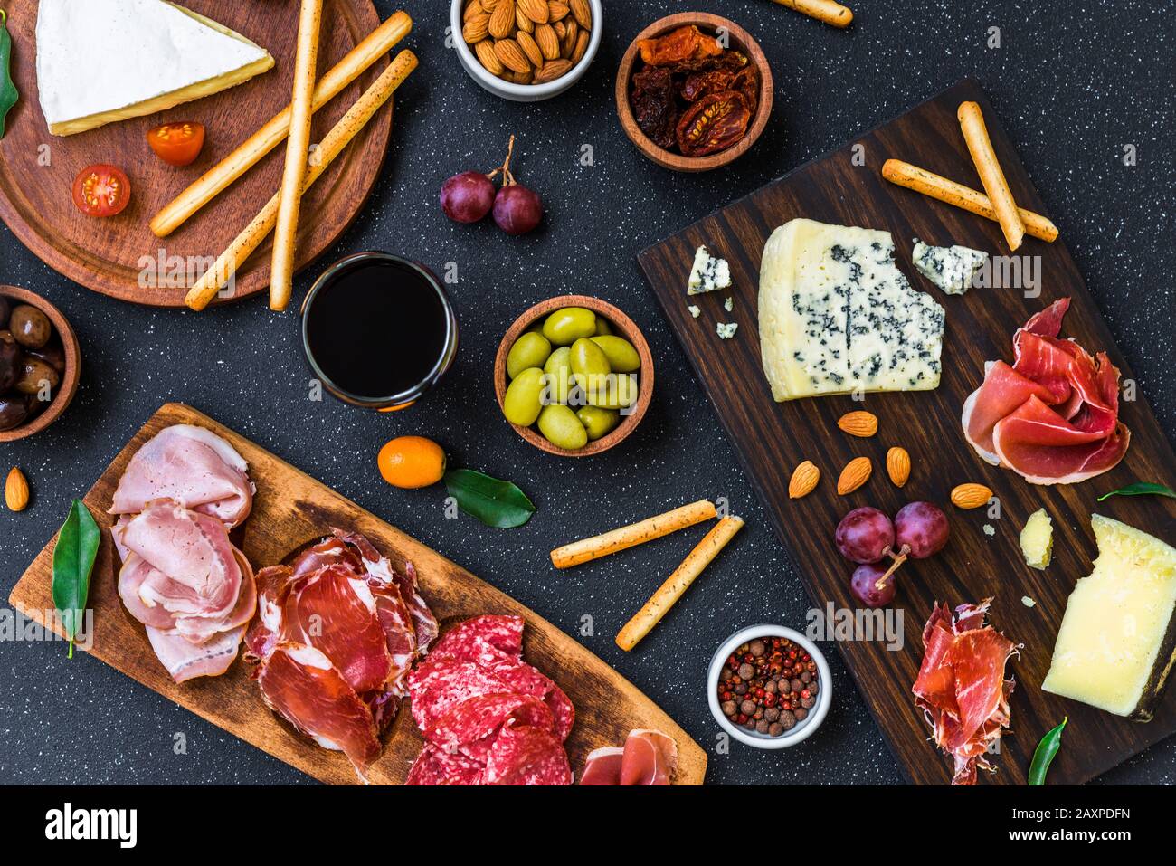 Table of antipasti and appetizers with cold meats and cheese deli ...