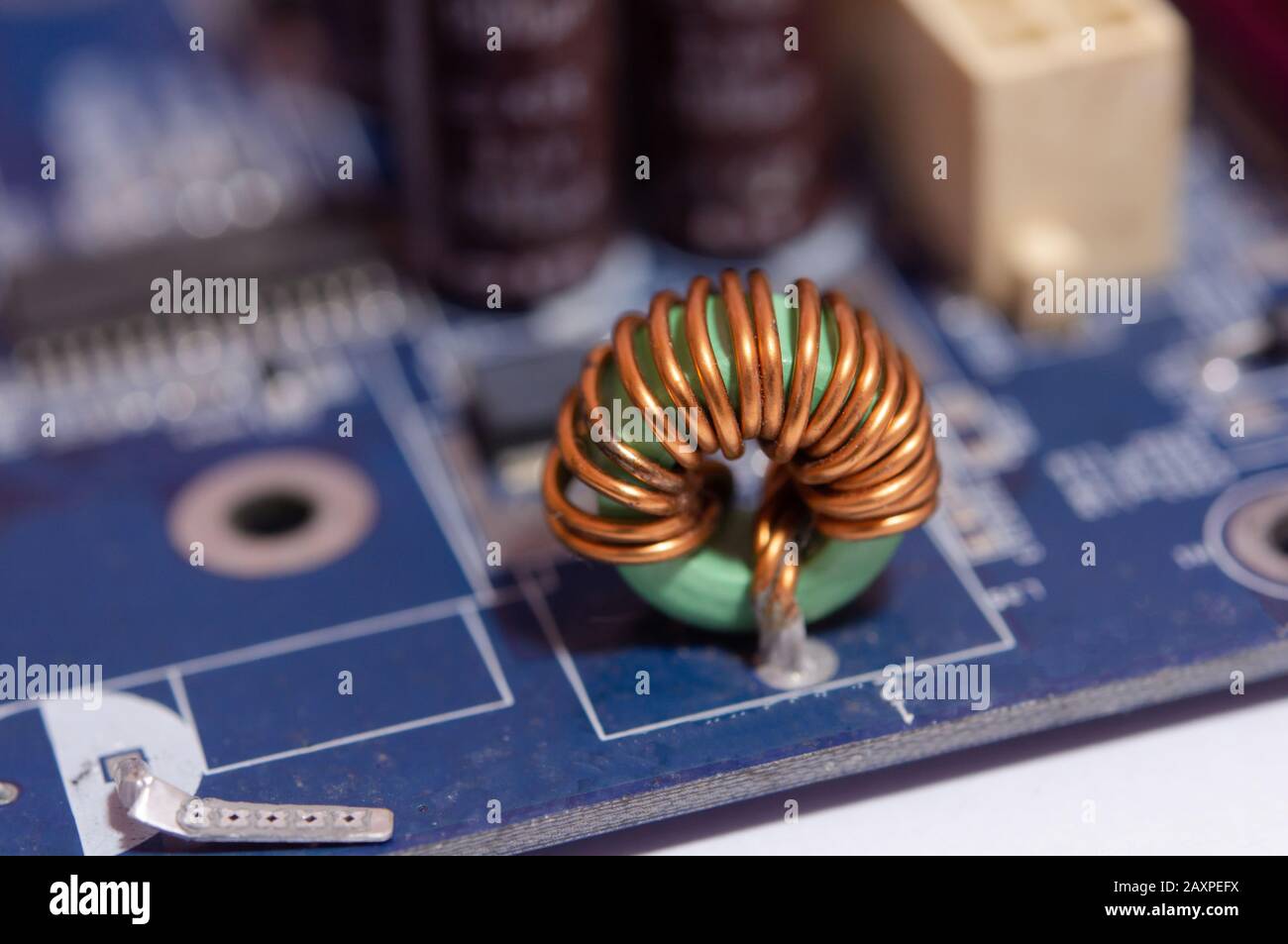 Close up Inductor electronic hardware technology on motherboard digital ...