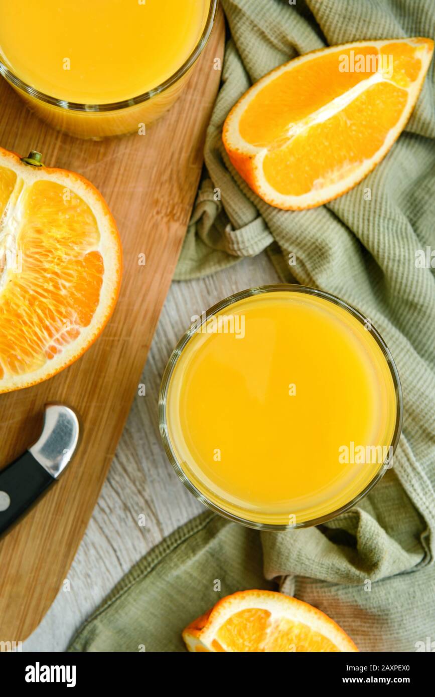 Still life with juice and oranges. Top view Stock Photo - Alamy
