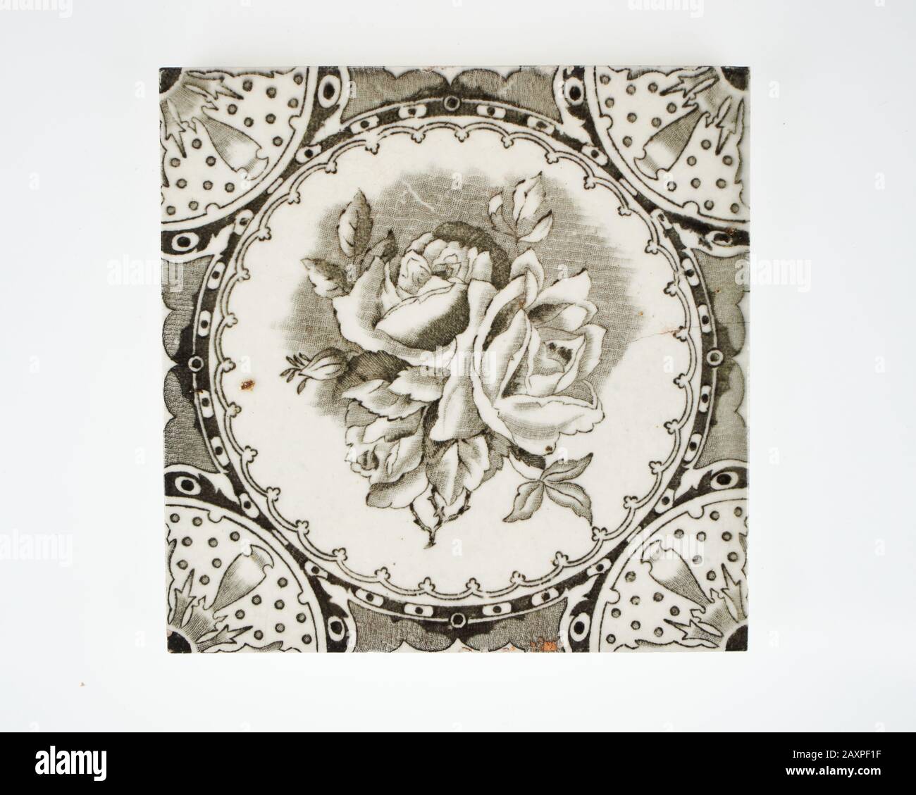 Antique Victorian rose pottery tile Stock Photo - Alamy
