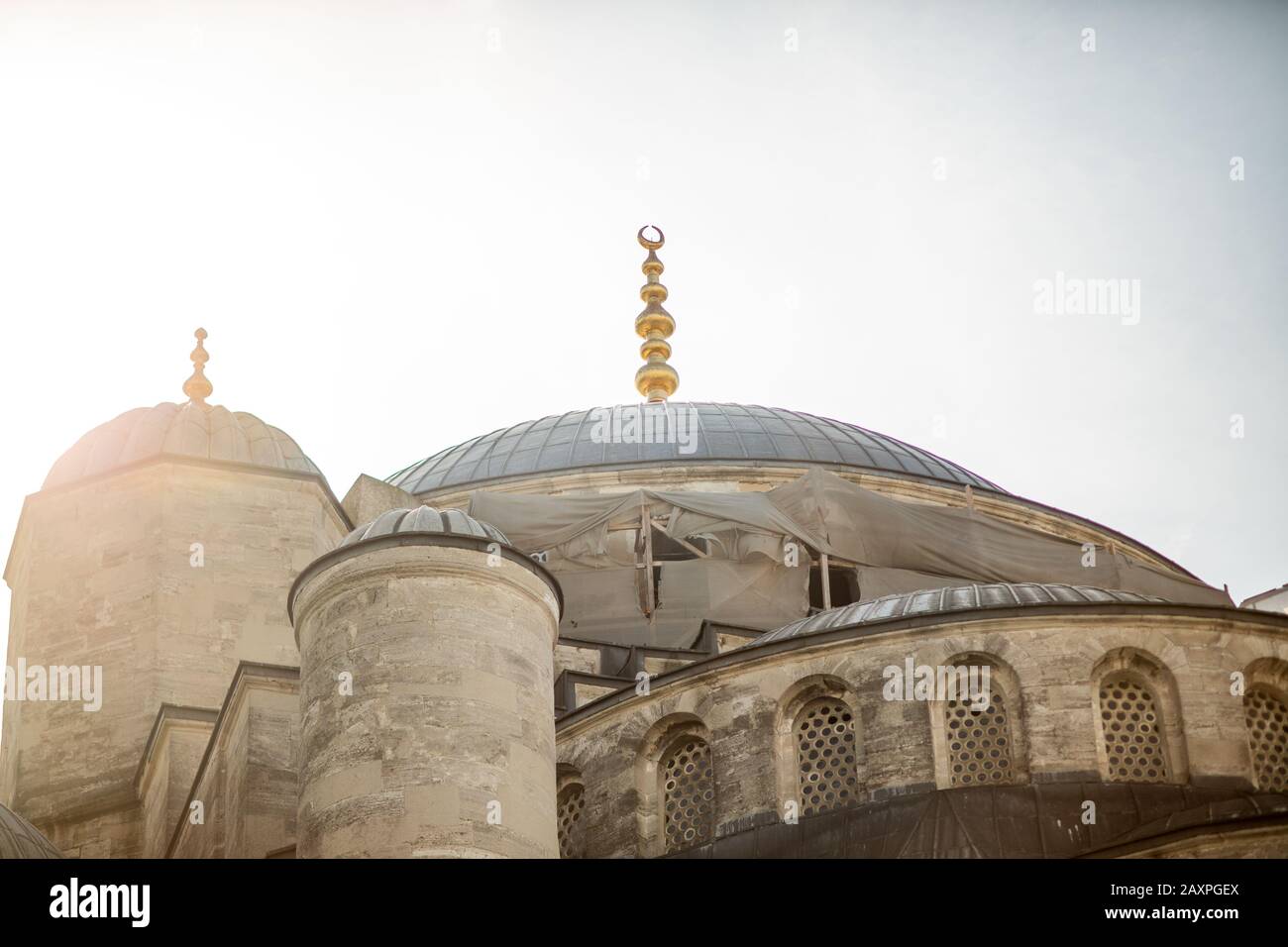 Dome of the Blue Mosque in Istanbul, Turkey. On the left, the sun ...