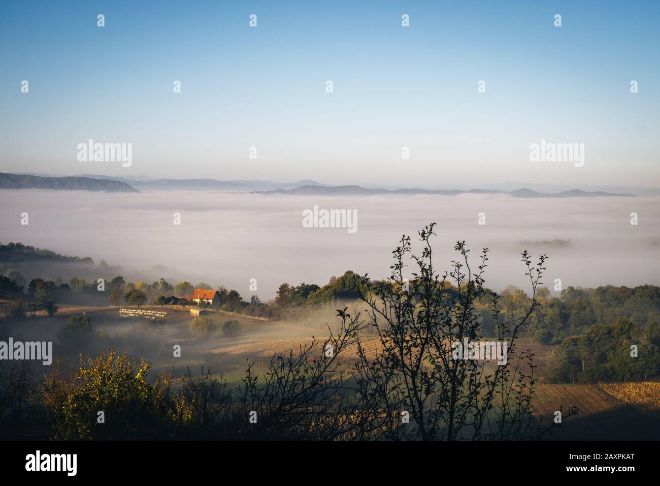 Dense fog over mountain hi-res stock photography and images - Alamy