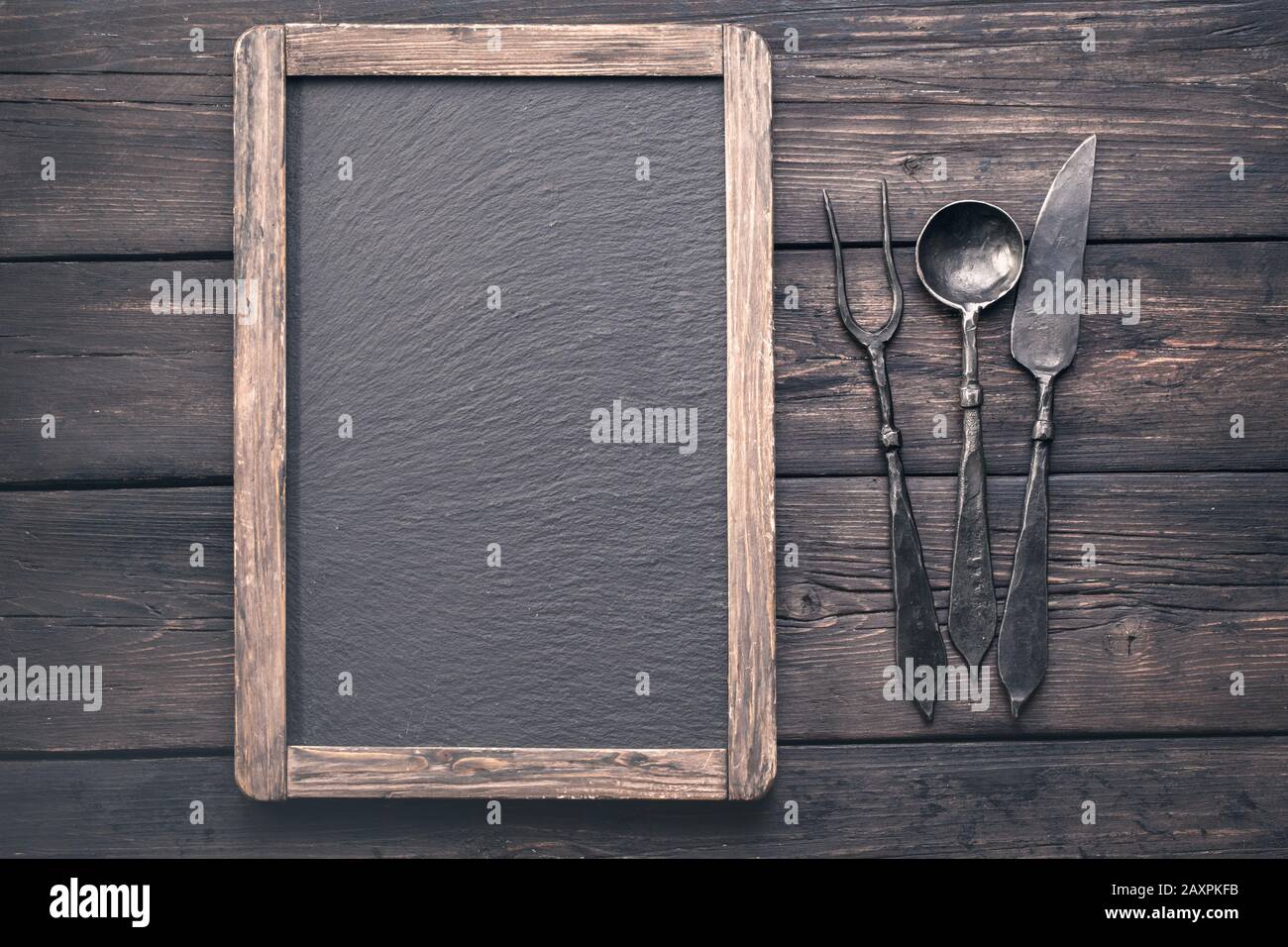 Menu blackboard with stylized cutlery Stock Photo - Alamy