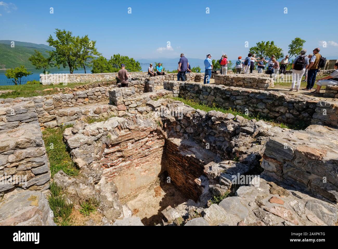 Tourist group, ruins of the basilica of Lin at lake Ohrid, region Korca ...