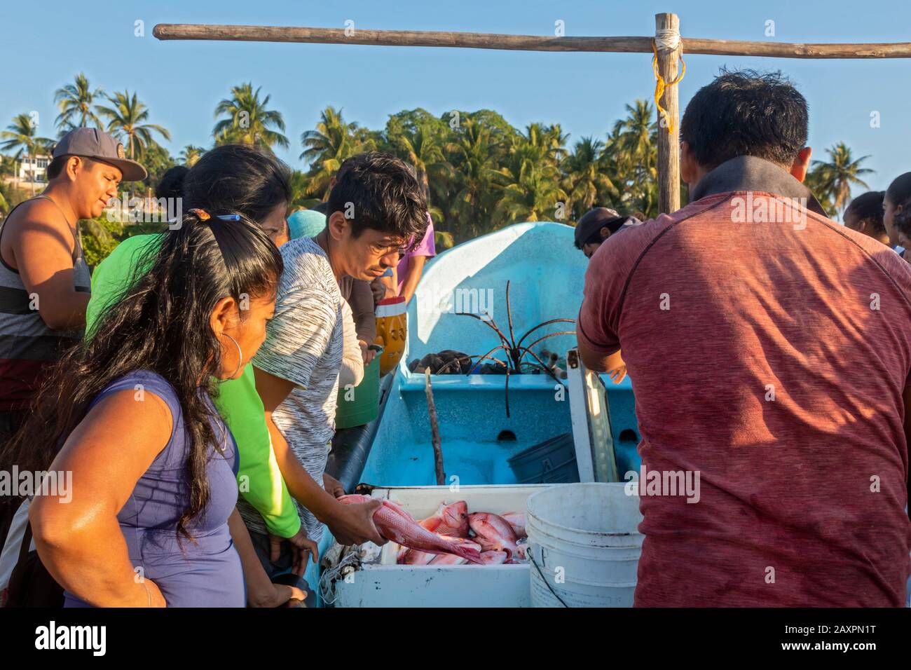 Puerto Escondido, Oaxaca, Mexico - People arrive at dawn on Puerto ...