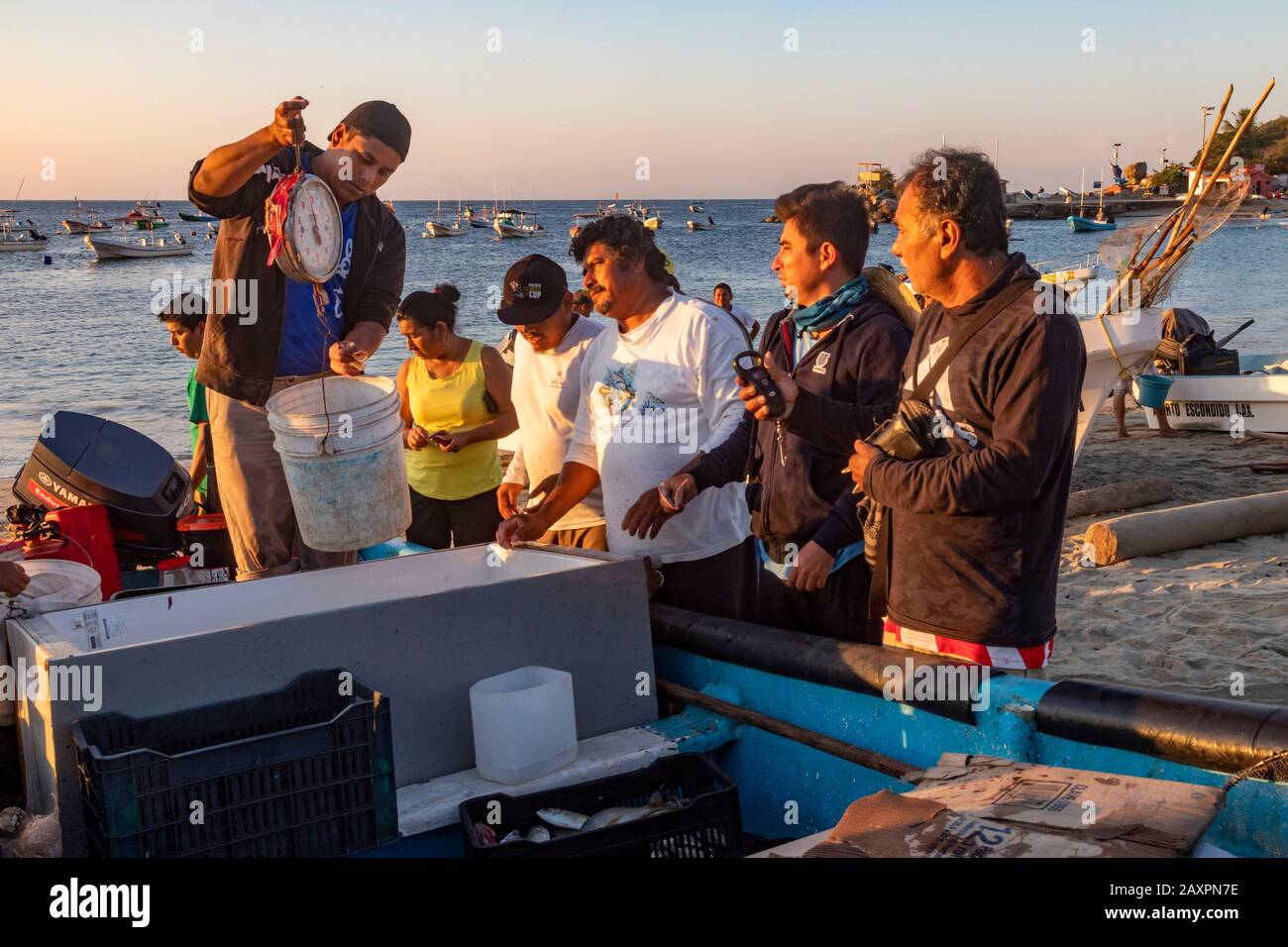 Puerto Escondido, Oaxaca, Mexico - People arrive at dawn on Puerto ...