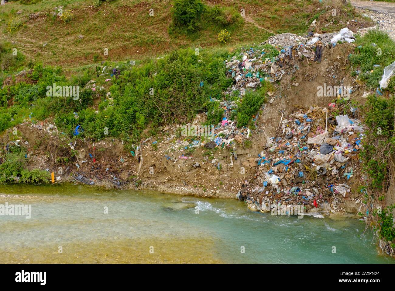 wild rubbish dump on the riverbank, Shushica river near Kotë, Qark ...