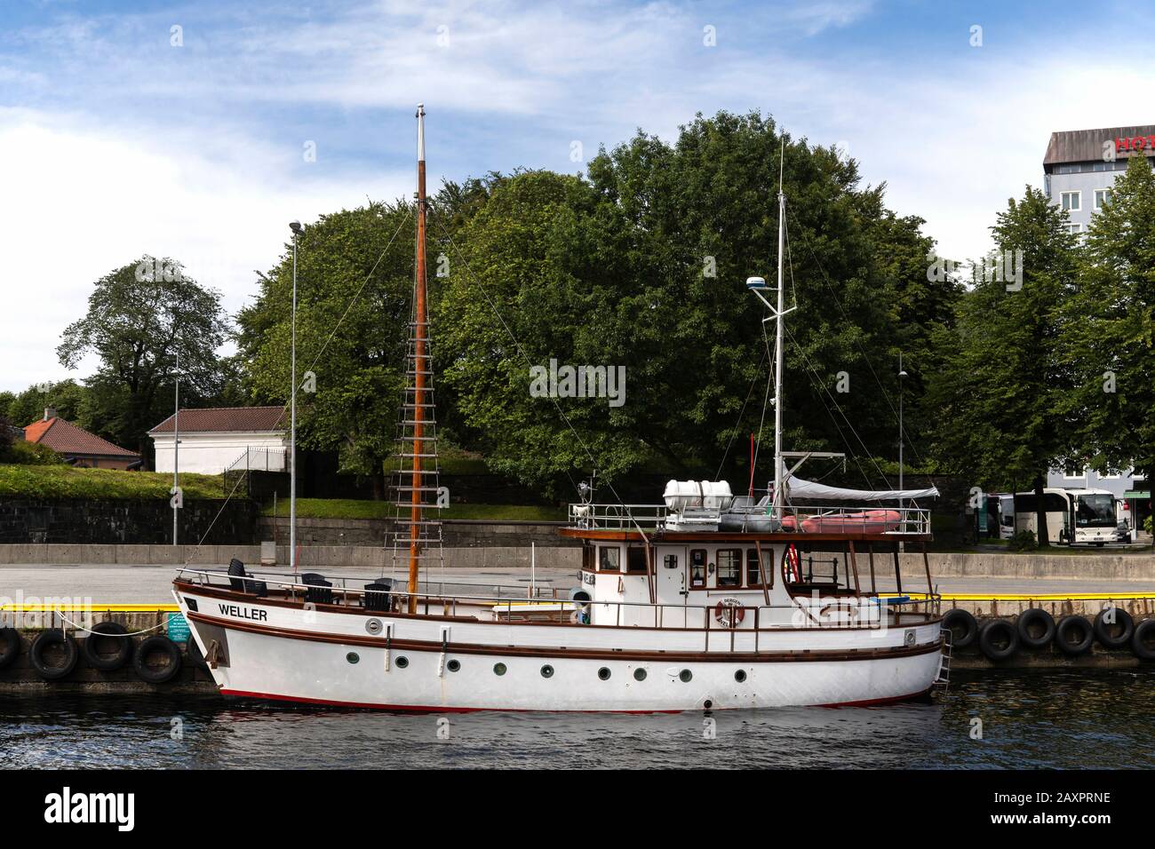 Motor yacht TSMY Weller (built 1947) alongside in Bergen harbor, west ...
