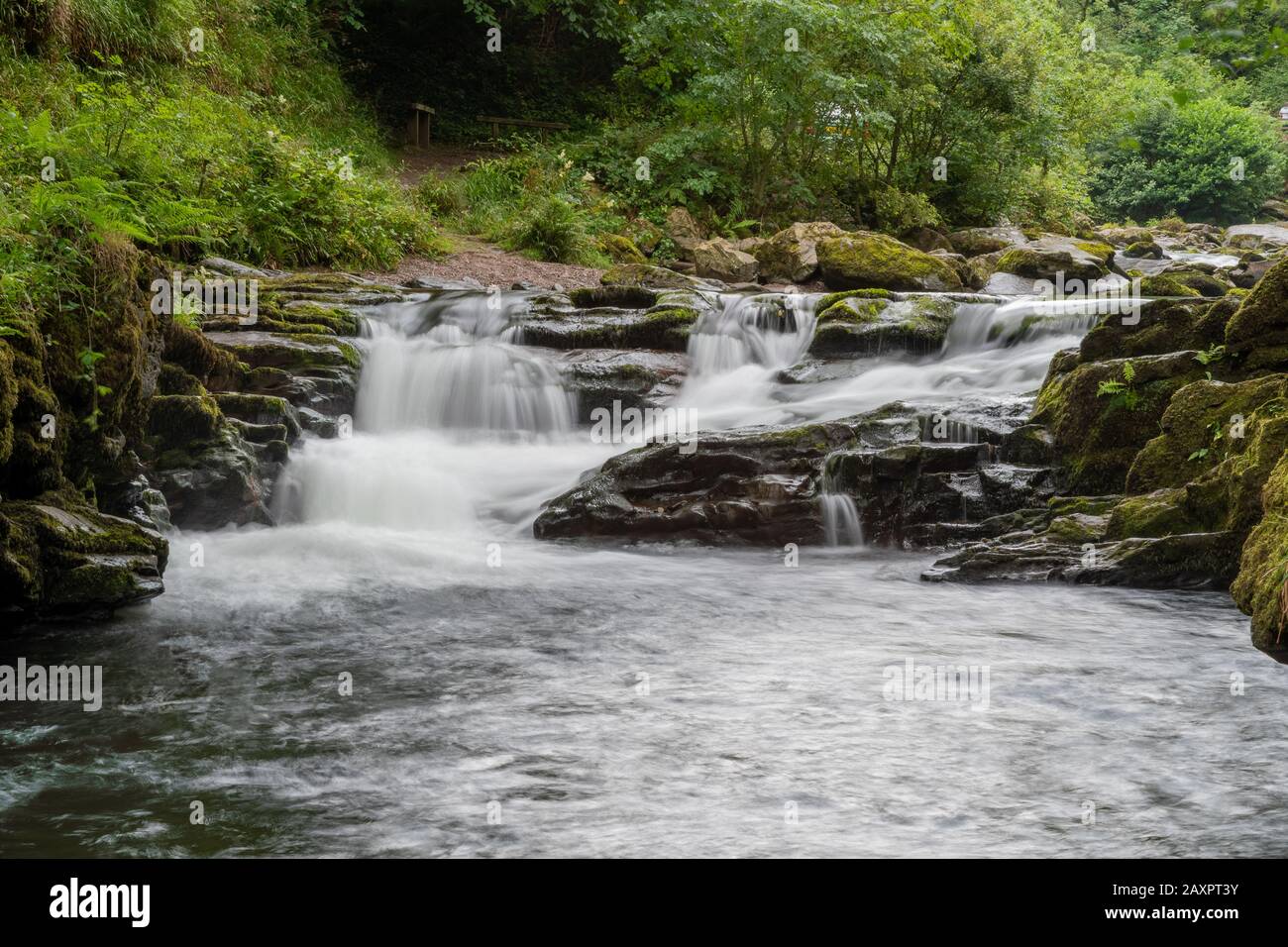 Long exposure of the waterfall at Watersmeet bridge pool at Watersmeet ...