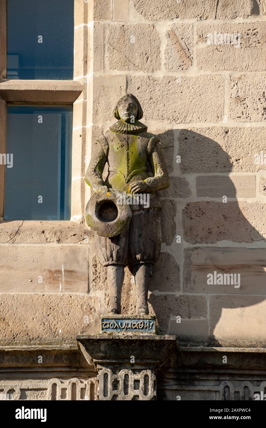 Statues on former boys school, now the library in historic Shrewsbury ...