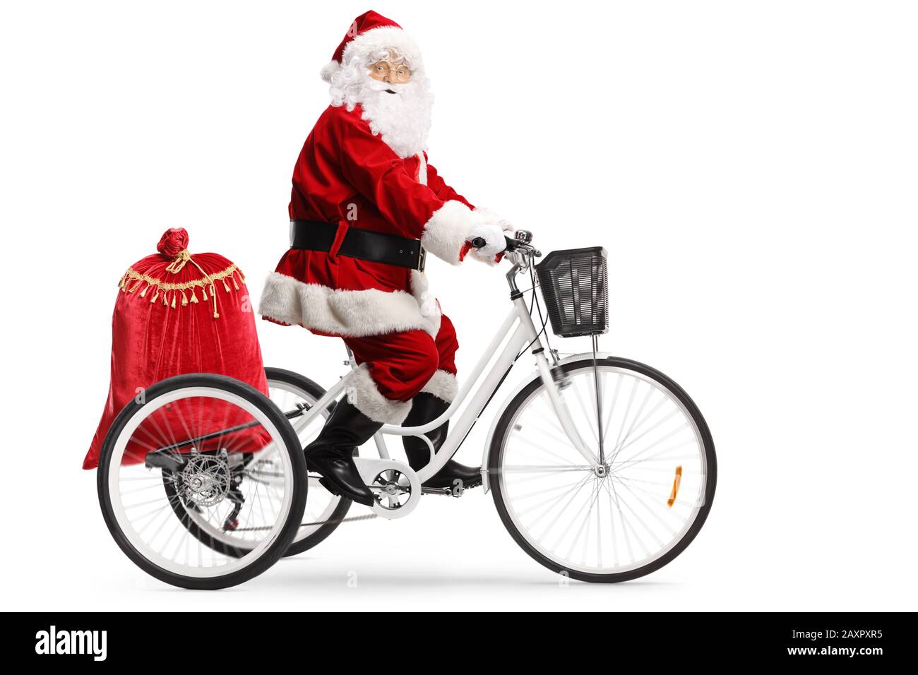 Santa Claus riding a tricycle with a sack of presents isolated on white ...