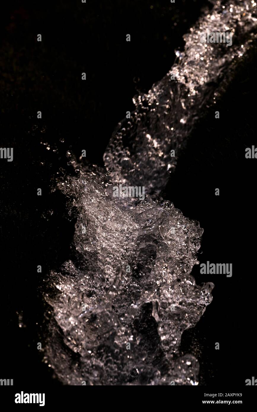 Small water trickle of a spring in the Karwendel Stock Photo - Alamy