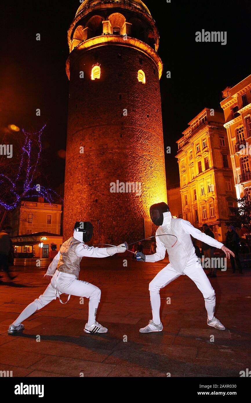 Fencing fight at Galata Tower in Istanbul, Turkey Stock Photo - Alamy