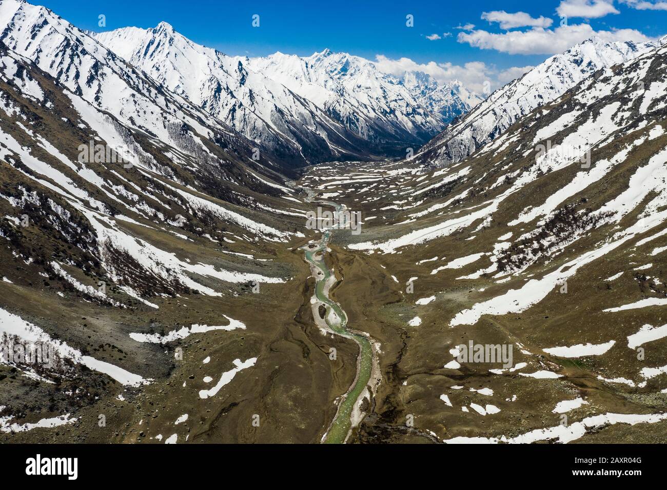 Rugged alpine river valley with snowy mountains, Nepal Himalaya Stock ...