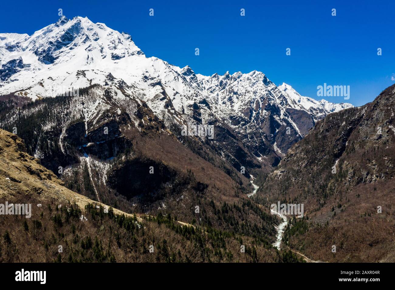 steep rugged river valley landscape in the mountains, Himalaya Nepal ...