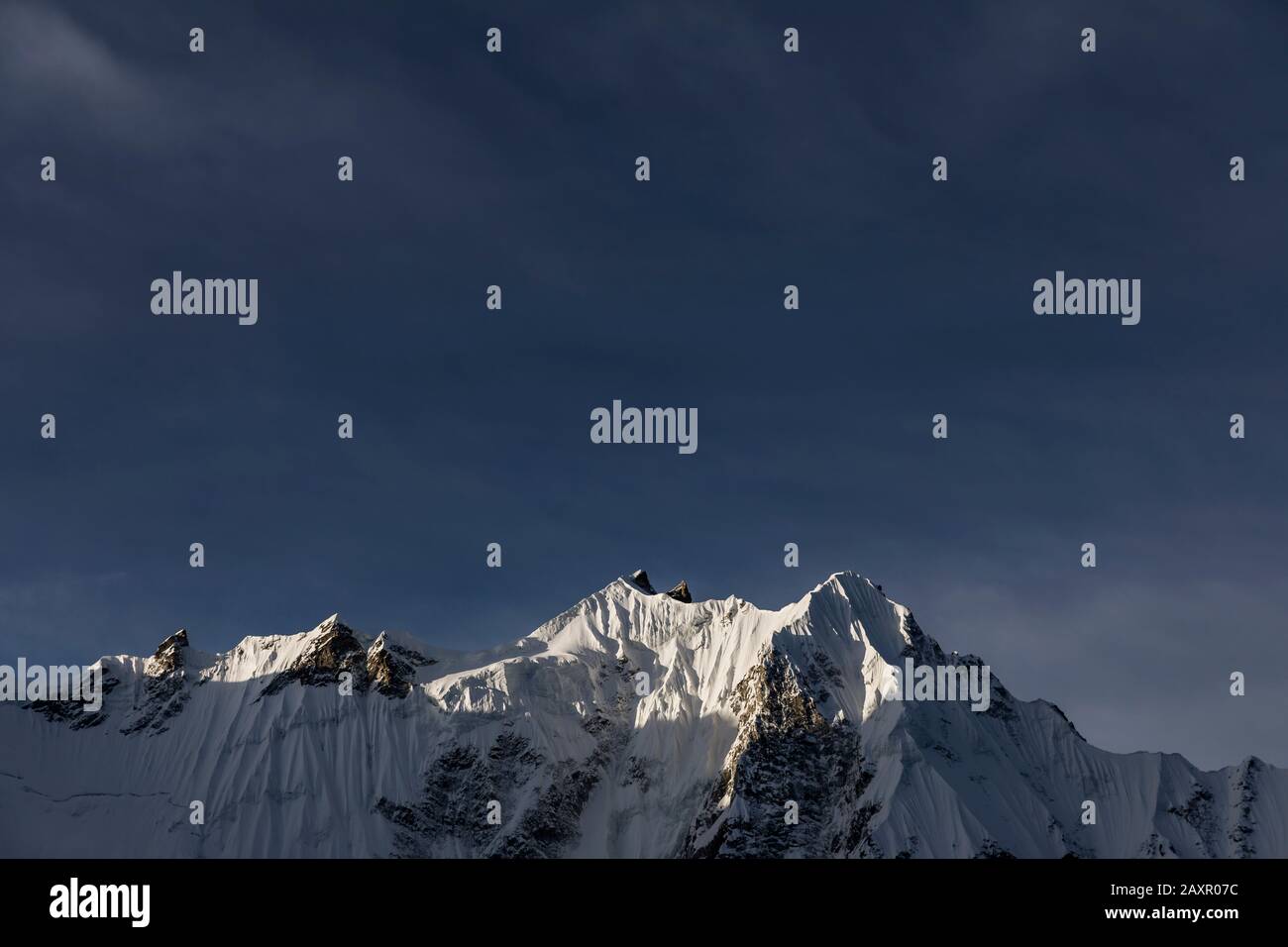 Alpine landscape with snowy mountain ridge in the Nepal Himalaya Stock ...