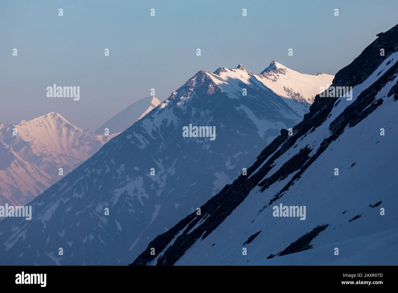 Alpine landscape with snow covered mountains in the Nepal Himalaya ...