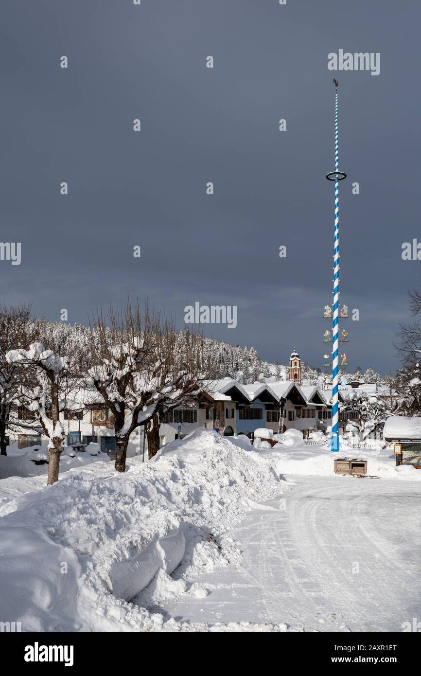 Maypole in the winter snowy mittenwald hi-res stock photography and ...