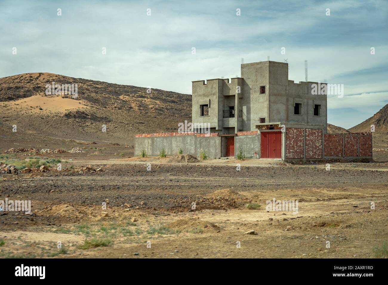 Melaab, Morocco - Unpainted exposed concrete residential house, common ...