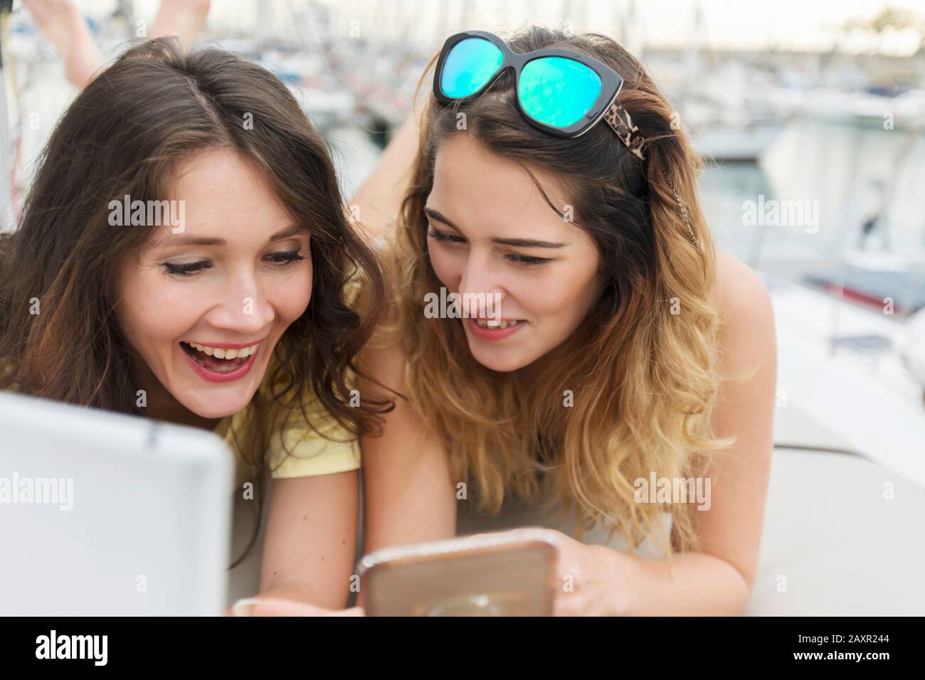 Happy joyful female friends enjoying talks and having fun online Stock ...