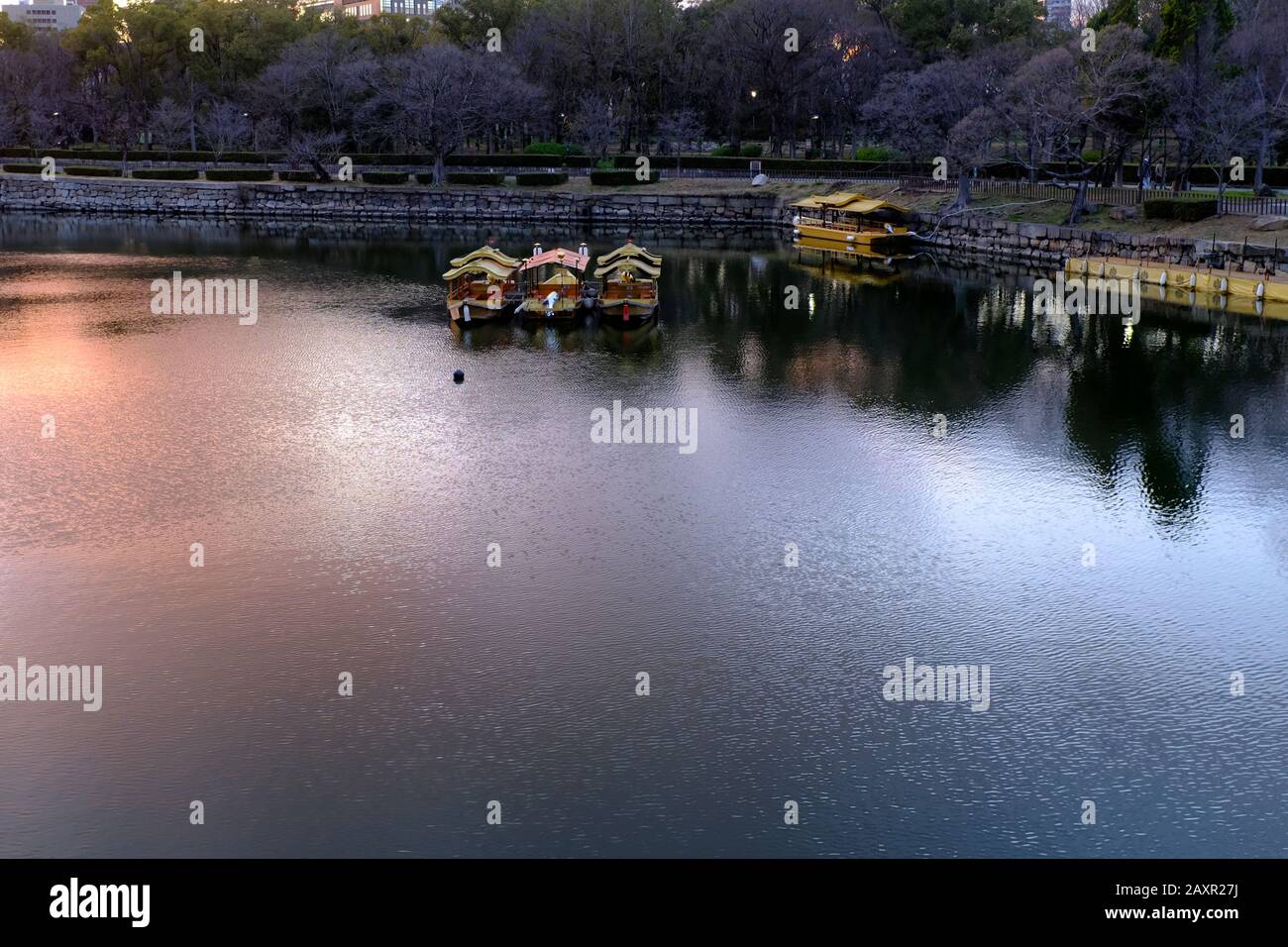 Boats in the moat outside of the Osaka Castle, Osaka, Japan Stock Photo ...