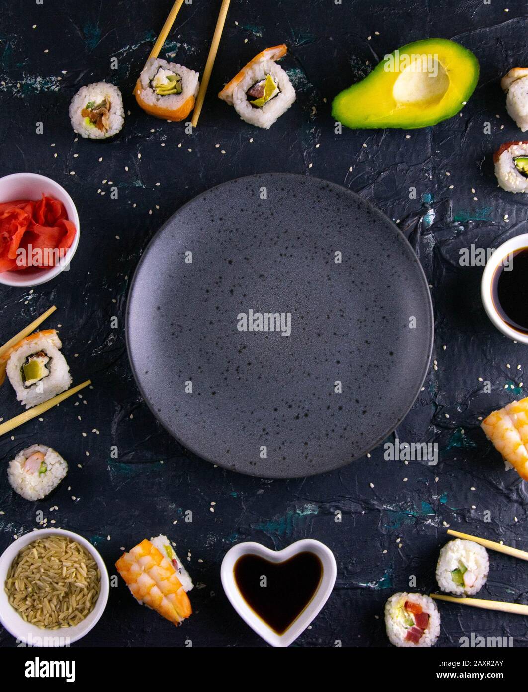 Different roles, avocado, red marinated ginger, rice, soy sauce are ...