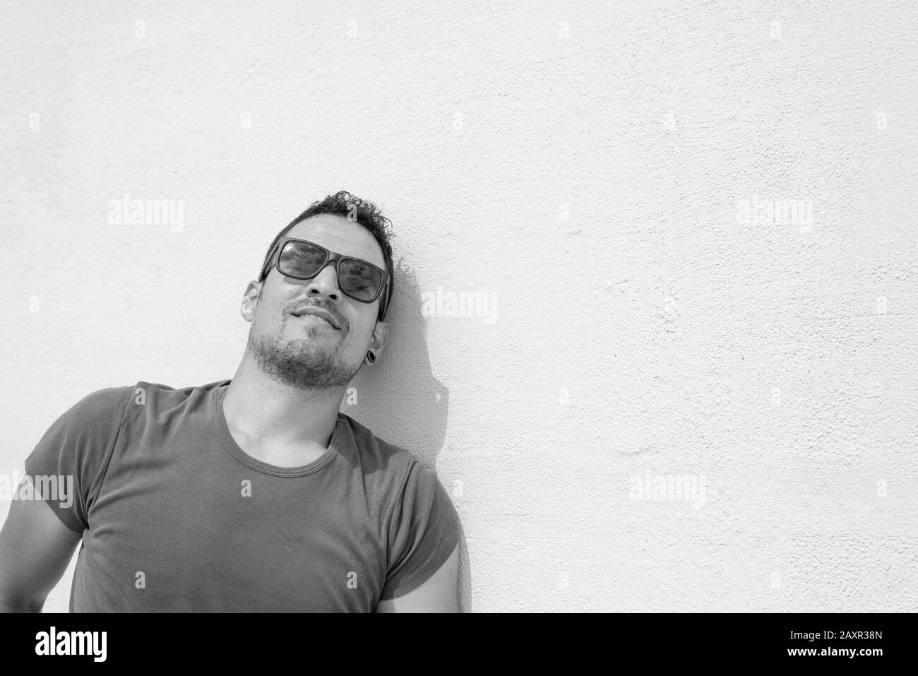 Bright yellow shirt Black and White Stock Photos & Images - Alamy