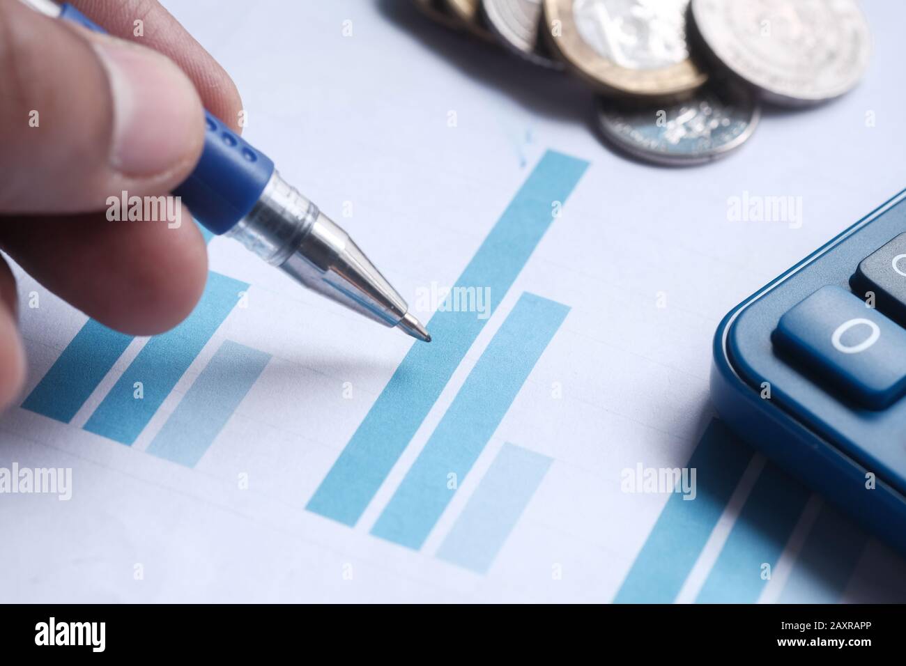 Close up of man hand analyzing chart on paper Stock Photo - Alamy