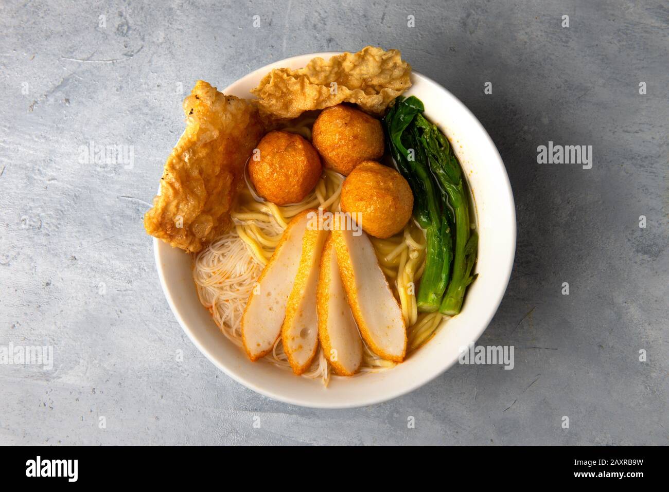 keow teow soup with fishballs and fishcakes chinese style with ...