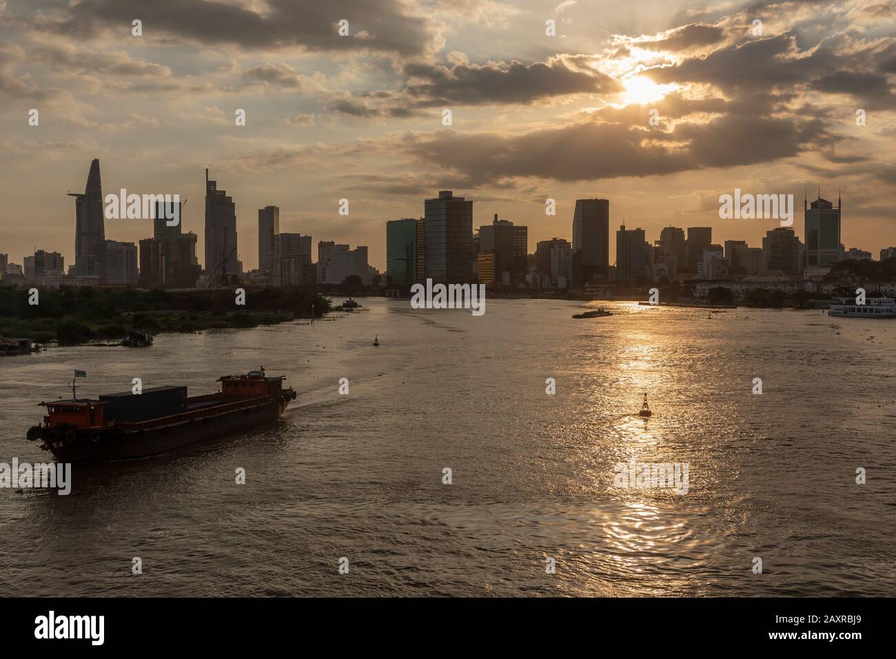 Saigon River Sunset with Ho Chi Minh City Skyline at golden hour ...