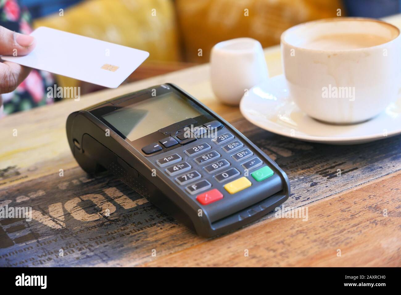 contactless payment by credit card at cafe Stock Photo - Alamy