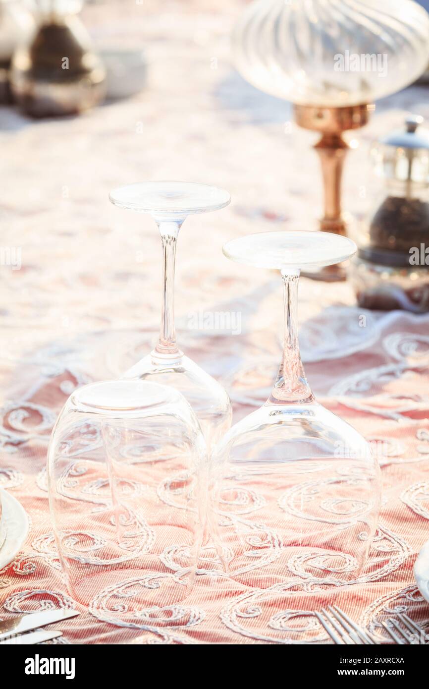 Special occasion table setting in a luxury outdoor restaurant. Festive ...