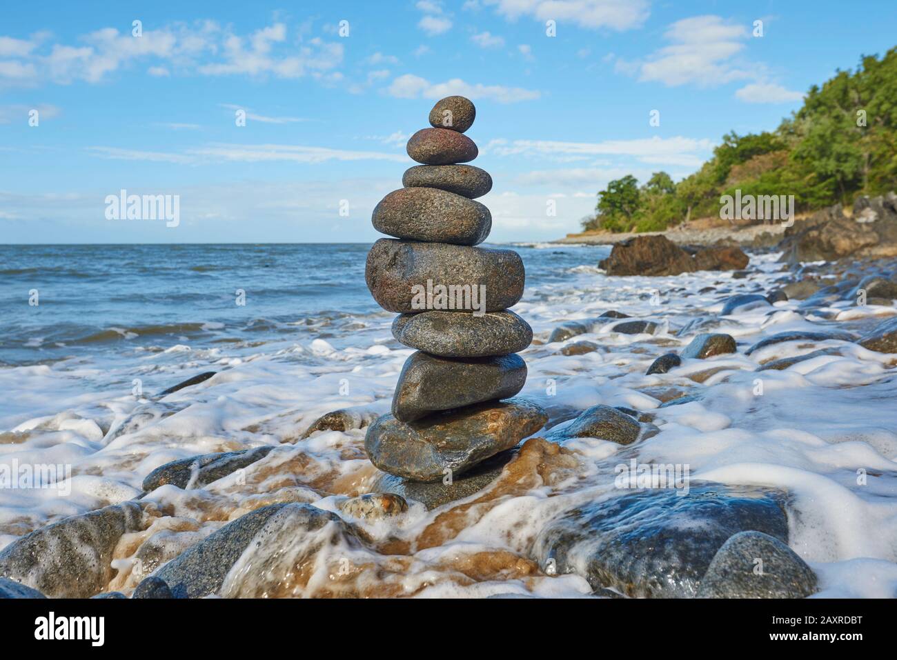 Stones, cairn at the beach, between Cairns and Port Douglas in spring ...