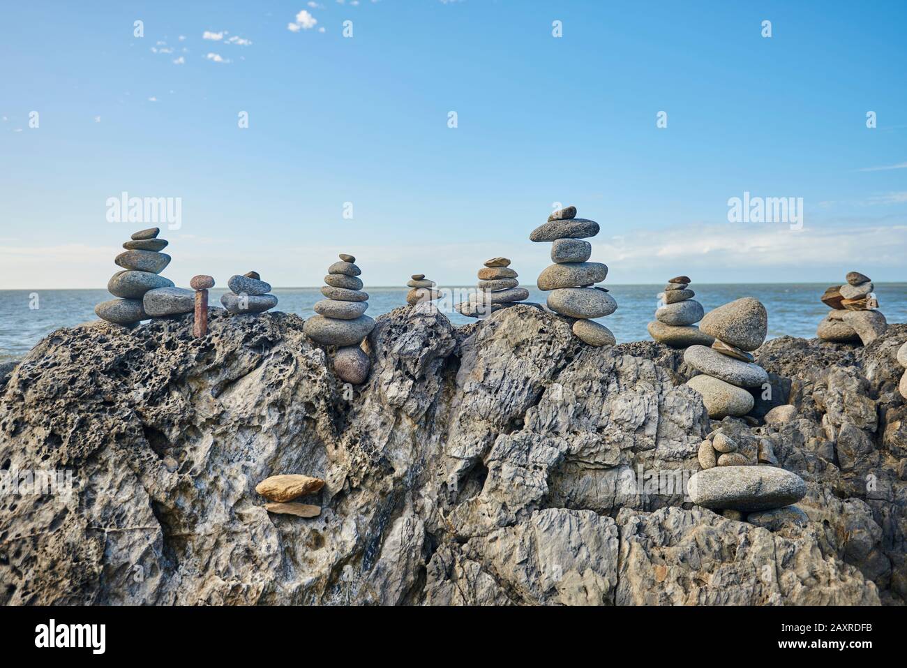 Stones, cairn at the beach, between Cairns and Port Douglas in spring ...
