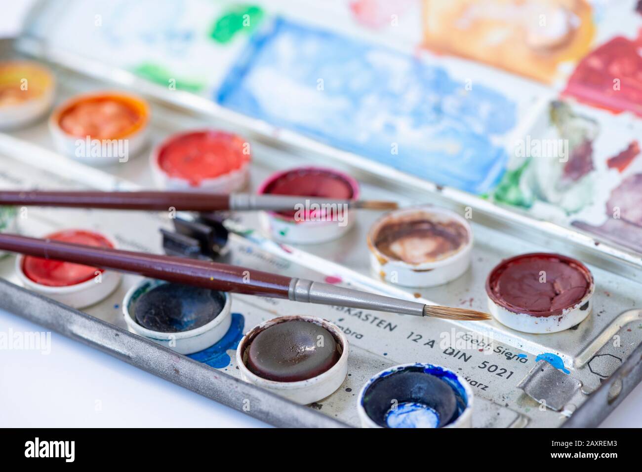 Old color box on white background Stock Photo - Alamy