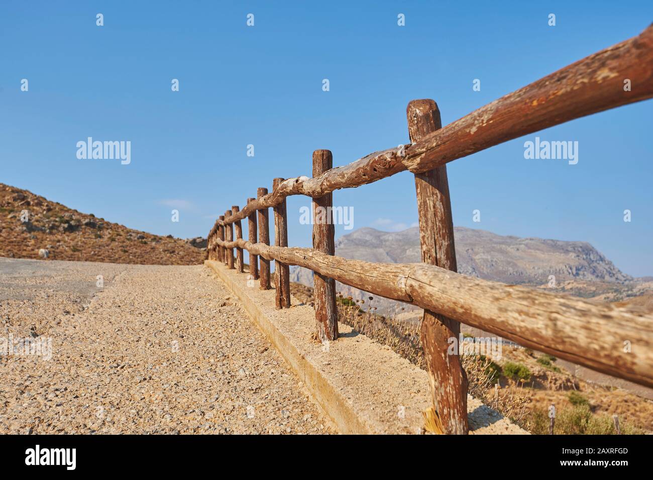 Wooden fence along a wall, Crete, Greece Stock Photo - Alamy