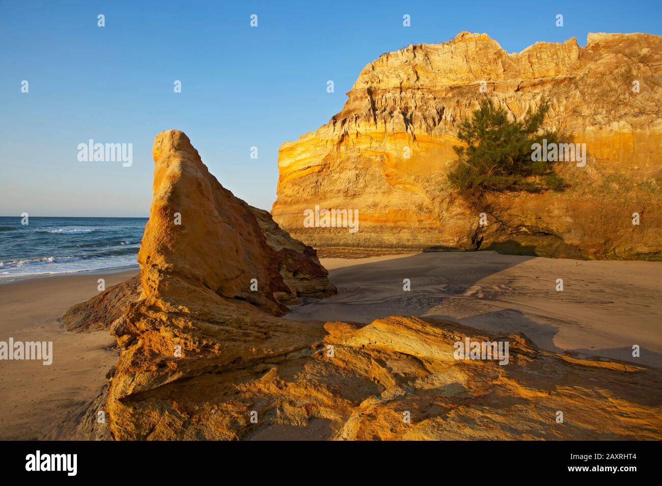 Glowing in the morning light sedimentary rocks on Five Mile Beach at ...