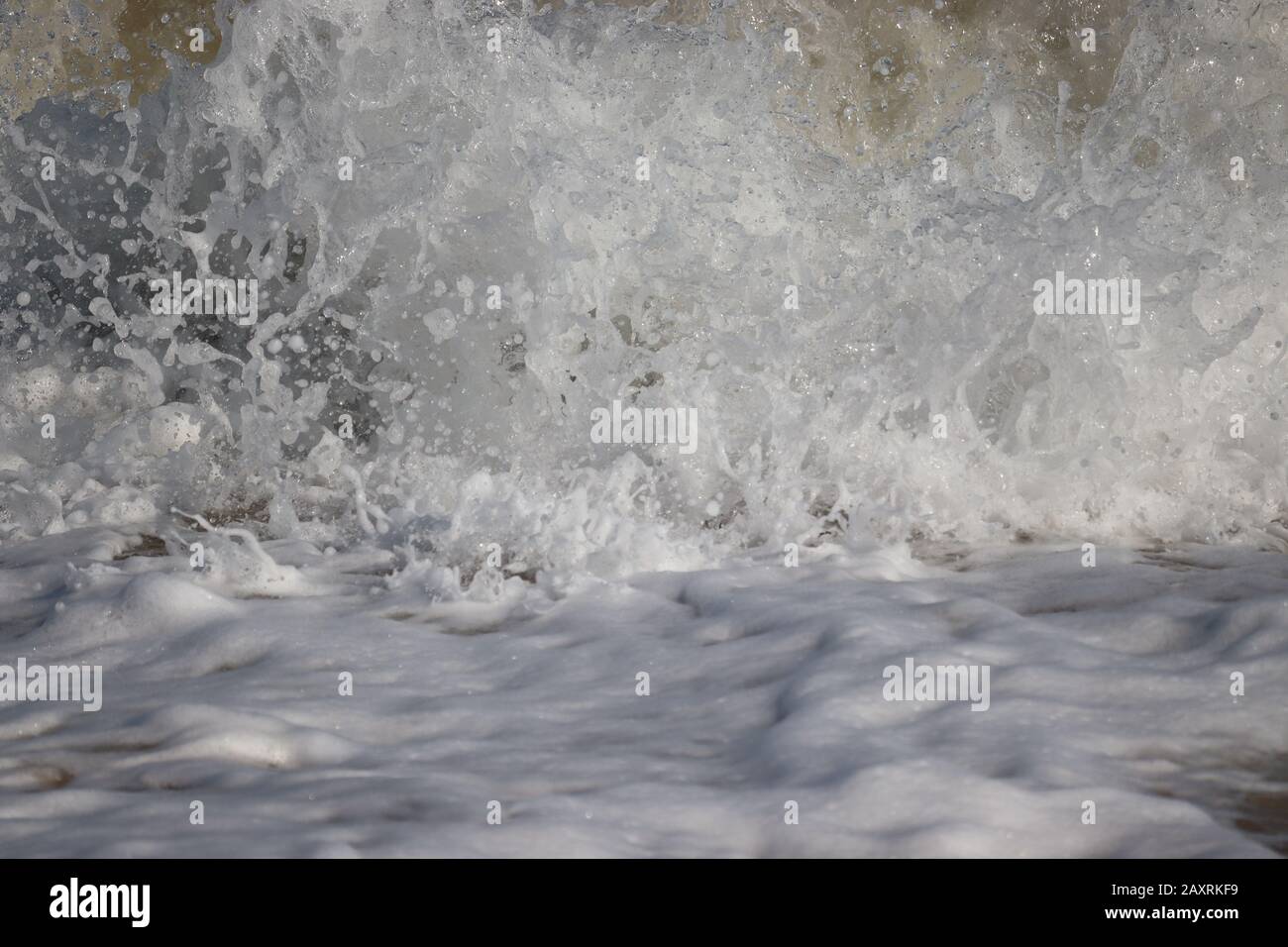 closeup of big water wave on the beach with water drop background, wave ...
