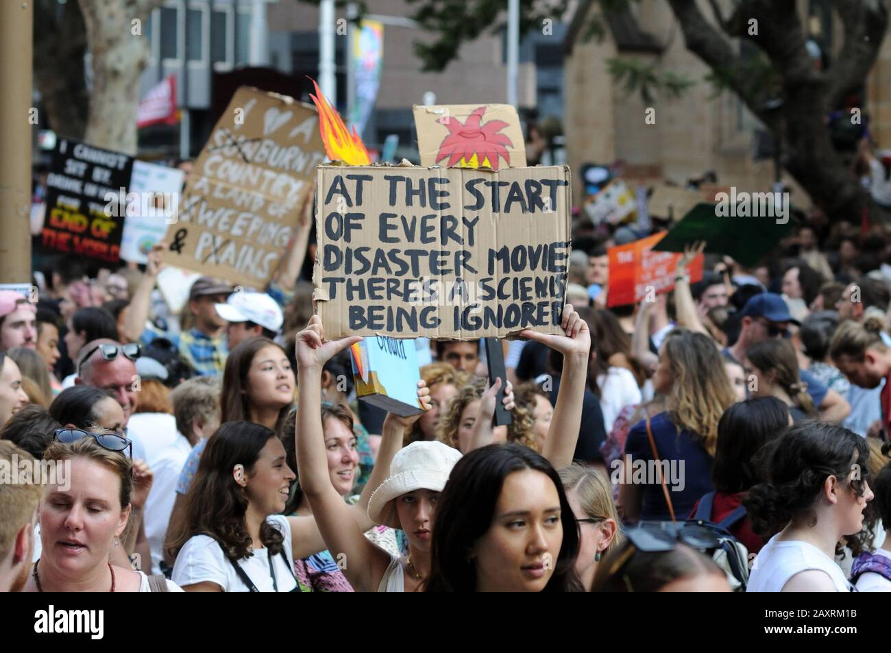 Placard reading 'At the start of every disaster movie there is a ...