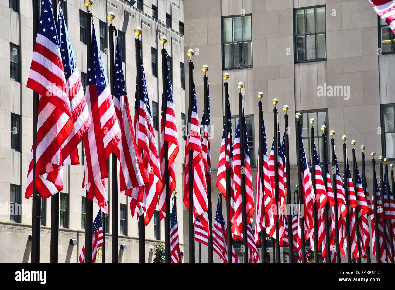 american flags in a row,rockefeller center,new york,usa Stock Photo - Alamy