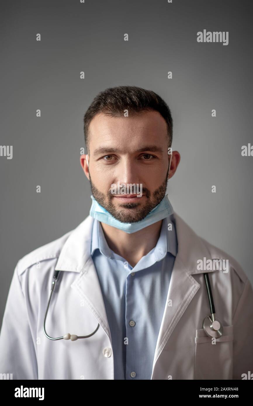 Handsome doctor hi-res stock photography and images - Alamy