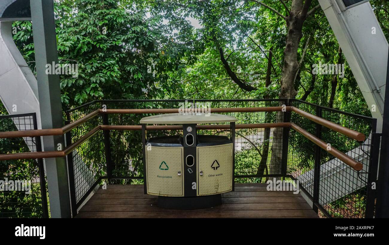 A modern trash can in a downtown park in Jakarta, Indonesia Stock Photo ...