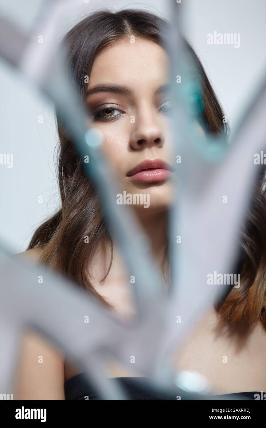 Girl looking in a broken mirror hi-res stock photography and images - Alamy