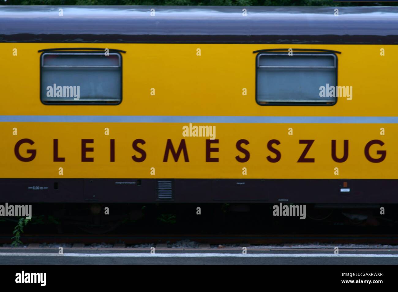 The close-up of the yellow body of a track train or rail vehicle Stock ...