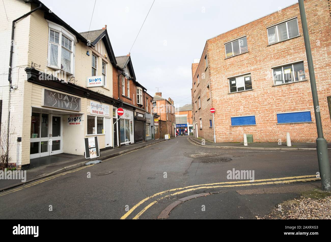 Pot hole on a back street road Stock Photo - Alamy