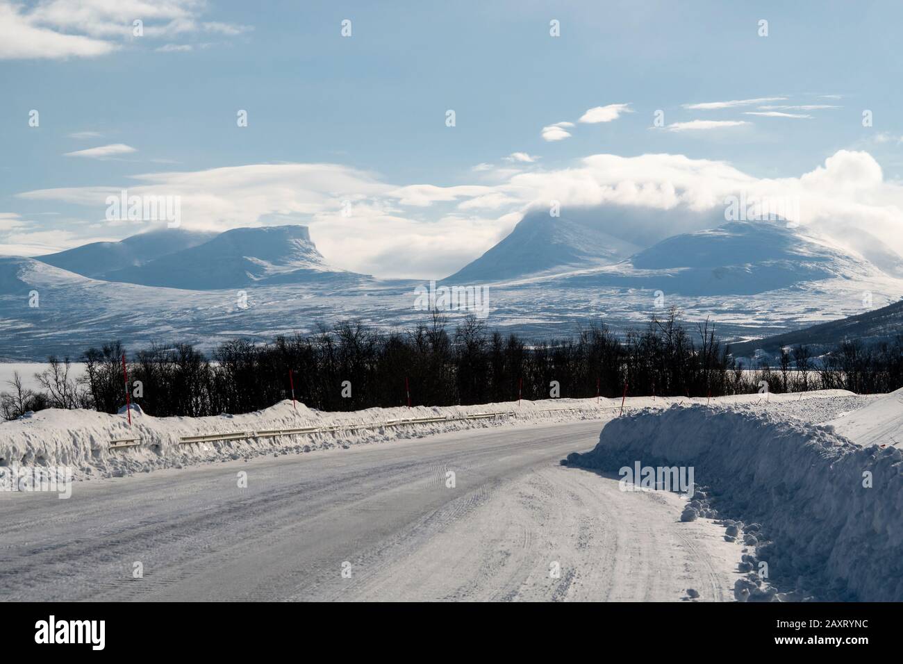 Sweden, Lapland, European Route E10, snowy landscape with Lappentor ...