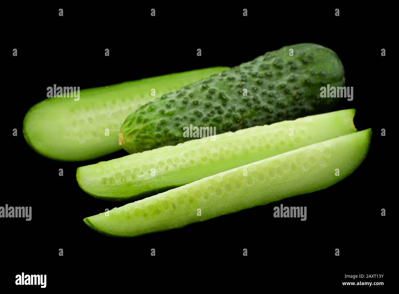 Cucumber vegetable closeup isolated on black background Stock Photo - Alamy