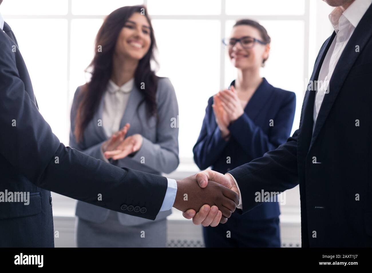 Handshake at business meeting after real deal Stock Photo - Alamy