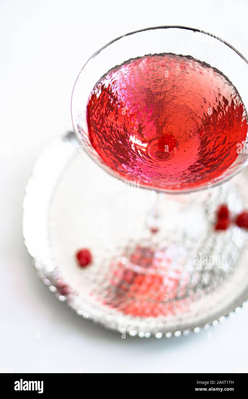Classic red cocktail in crystal texture glass on white background Stock ...