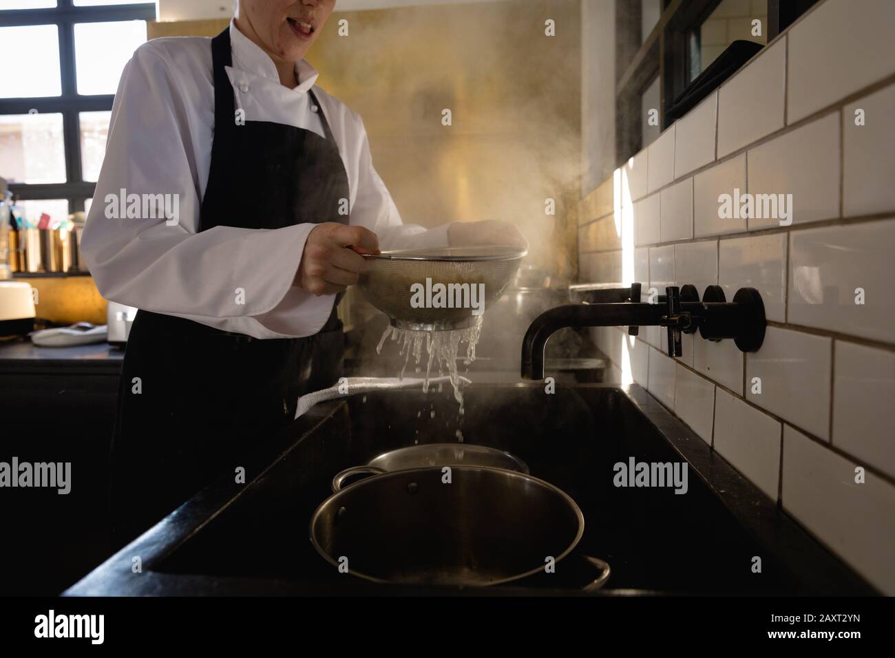 Caucasian chef dripping pasta hi-res stock photography and images - Alamy